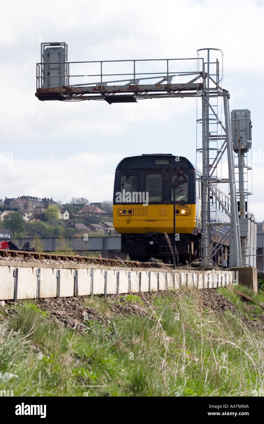 Local commuter train passing through Horbury Bridge Northern Class 142 ...