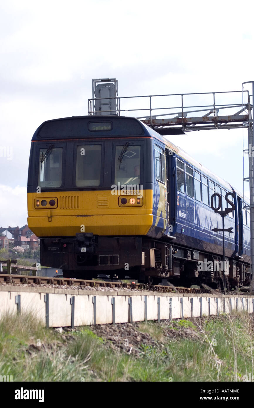 Local commuter train passing through Horbury Bridge Northern Class 142 ...