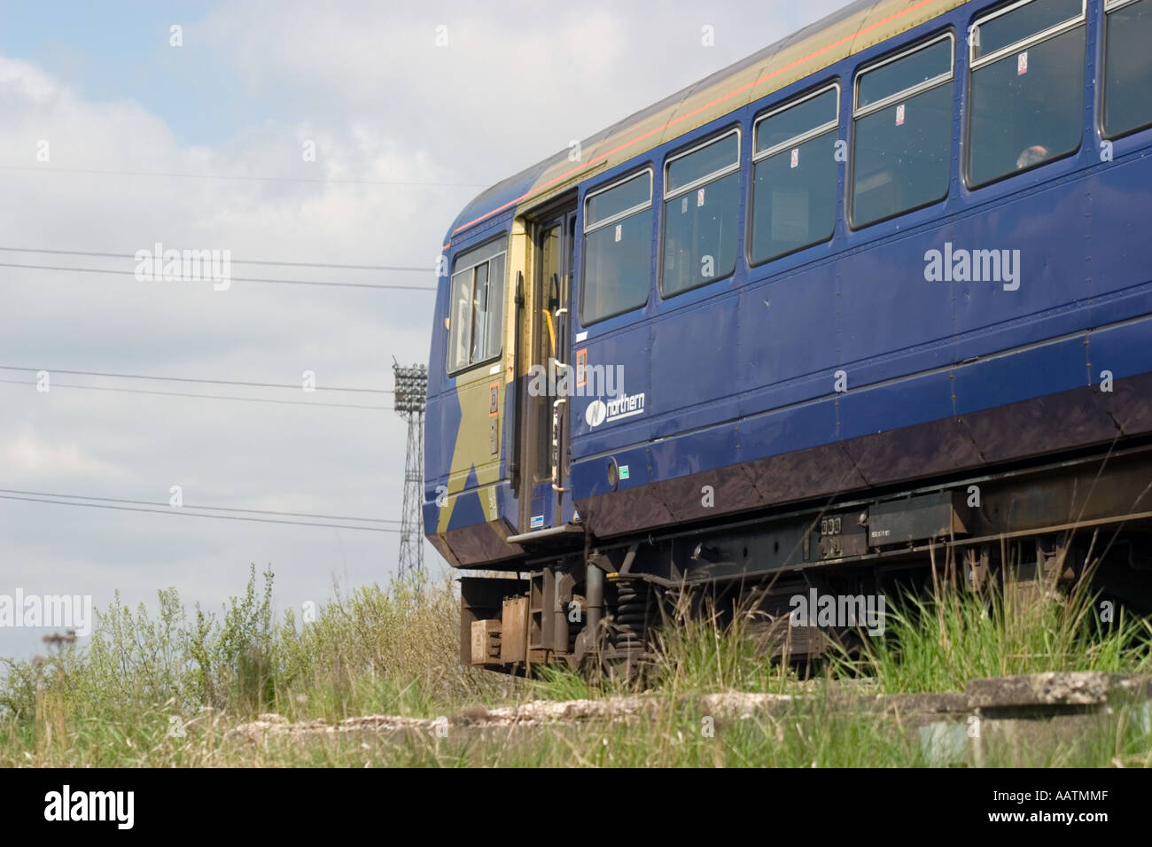 Local commuter train passing through Horbury Bridge Northern Class 142 ...