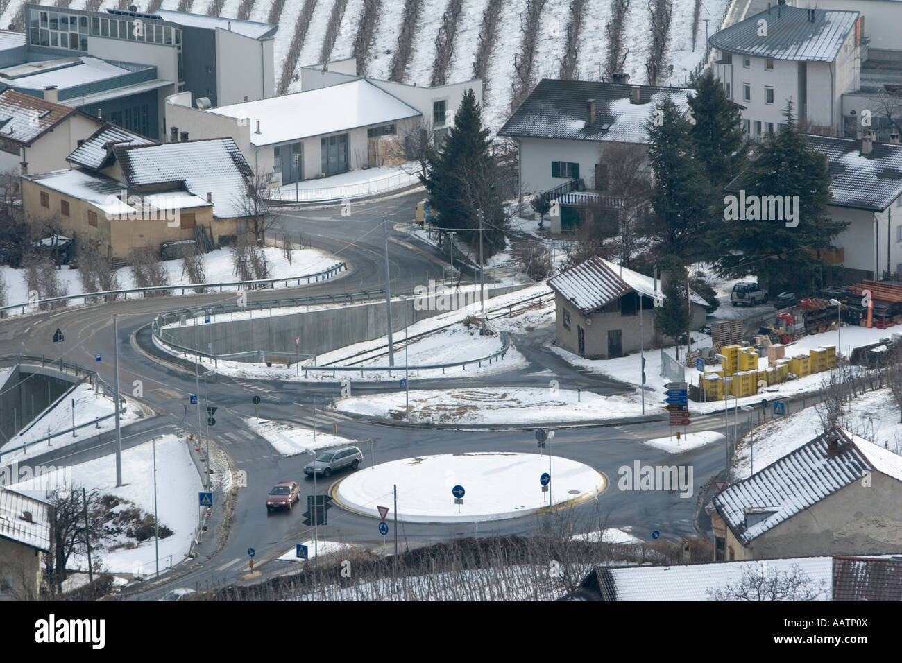 Train entering tunnel under roundabout, Corces, Alto Adige, Italy Stock ...