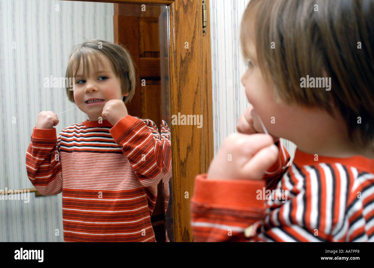 Child dental flossing hi-res stock photography and images - Alamy