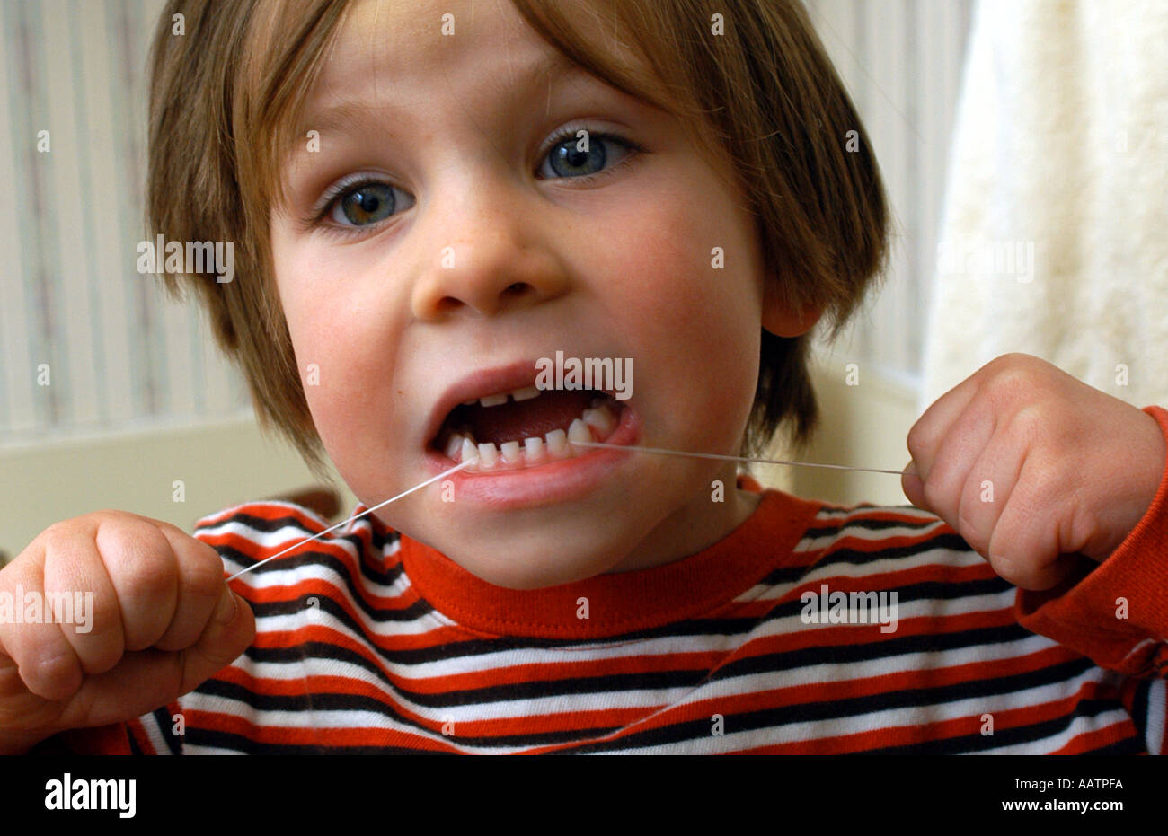 Child flossing hi-res stock photography and images - Alamy