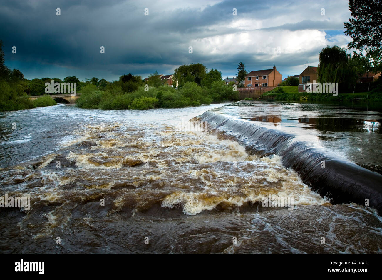 The River Ure in flood under stormy sky at Boroughbridge North ...