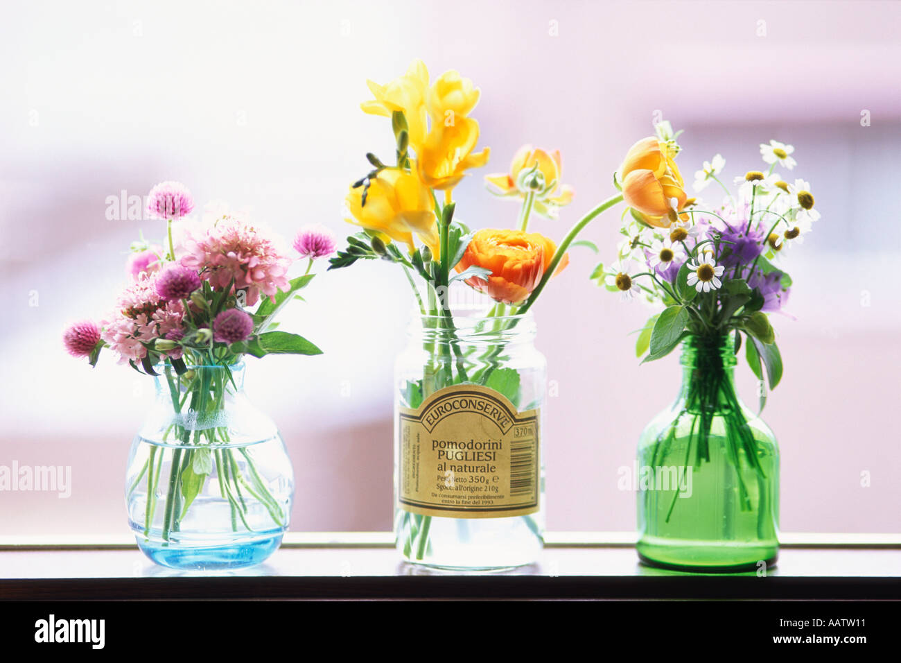 Three vases with flowers Stock Photo - Alamy