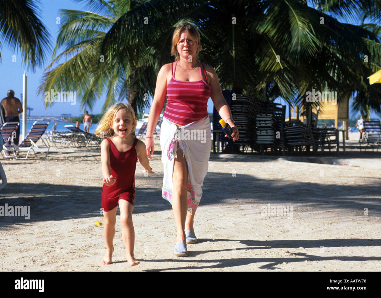 Nicky and Lucy walking on Boca Chica Beach Dominican Republic Caribbean ...