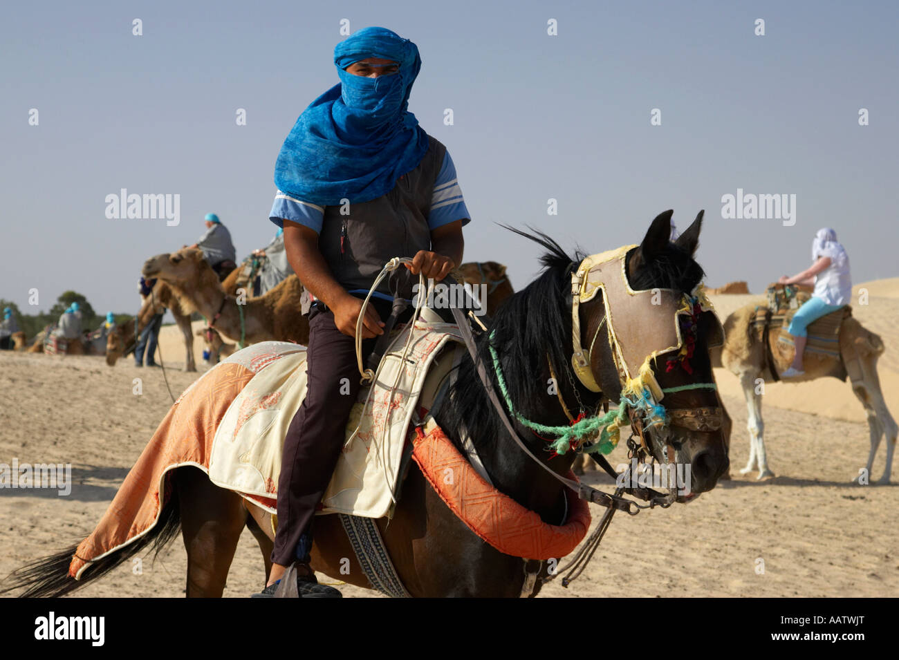 bedouin horse rider posing for tourist photos for money in tourist trap ...