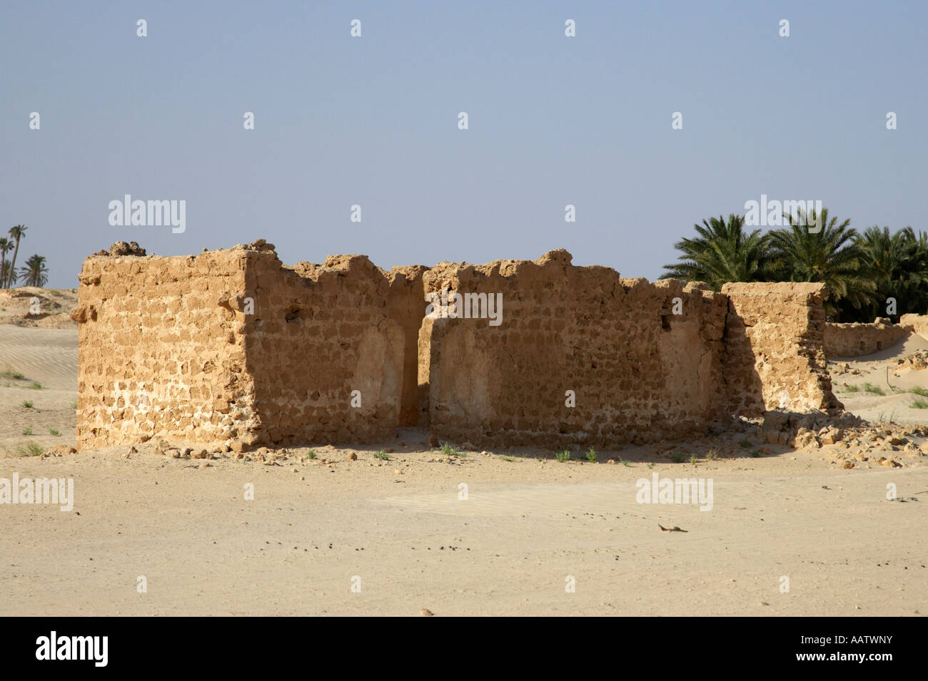 ruined abandoned building on the edge of the sahara desert at Douz ...