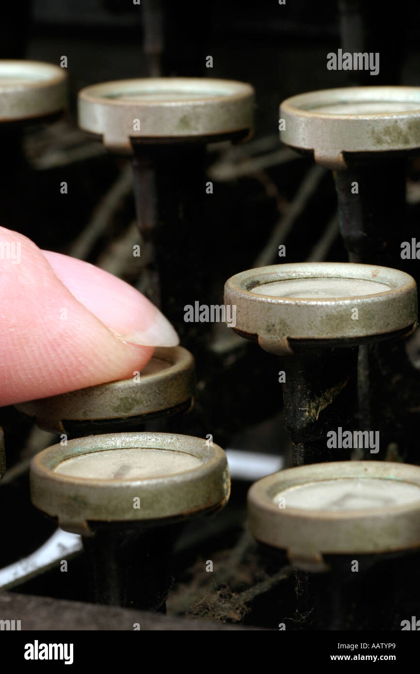 Finger Pressing Old Typewriter Key Stock Photo - Alamy