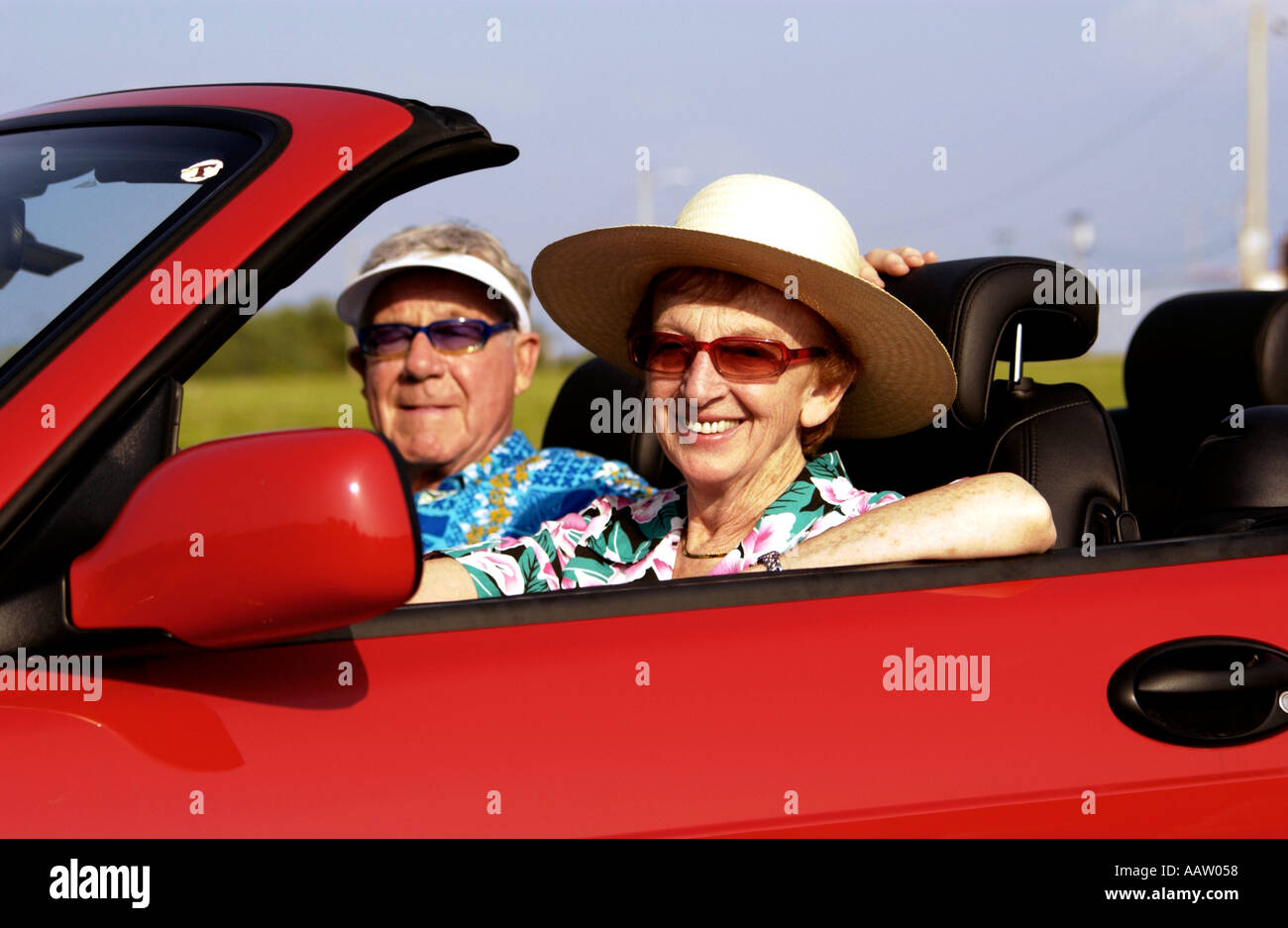 Senior couple in convertible Stock Photo - Alamy