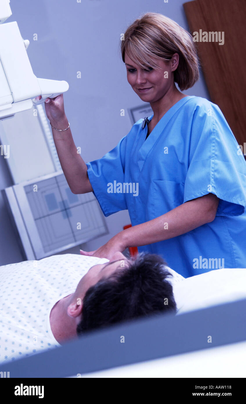 Xray tech taking xrays Stock Photo - Alamy