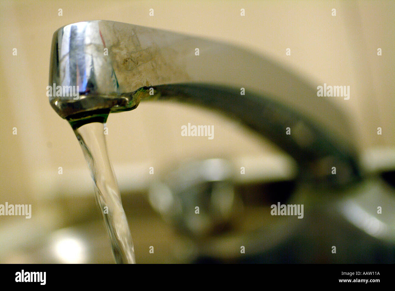 WATER RUNNING FROM A KITCHEN TAP Stock Photo - Alamy