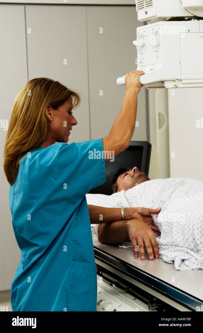 Patient having an xray taken Stock Photo - Alamy
