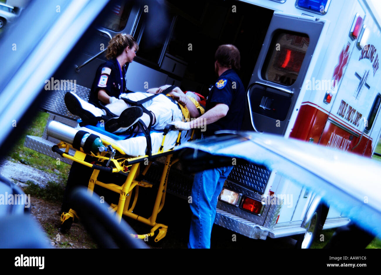 Emts loading patient ambulance hi-res stock photography and images - Alamy