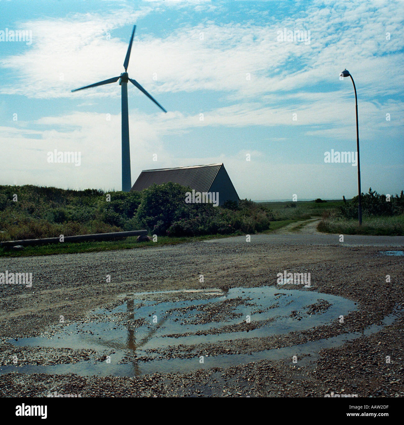 parking lot house and wind turbine by Thorsminde Harbour Thorsminde ...