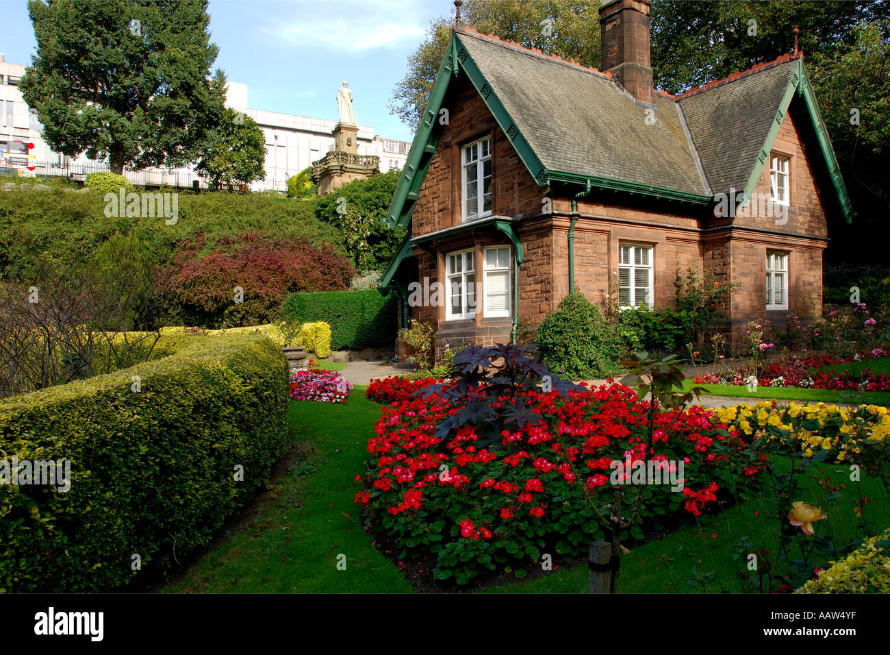Quaint looking traditionally built Victorian cottage in a parkland ...