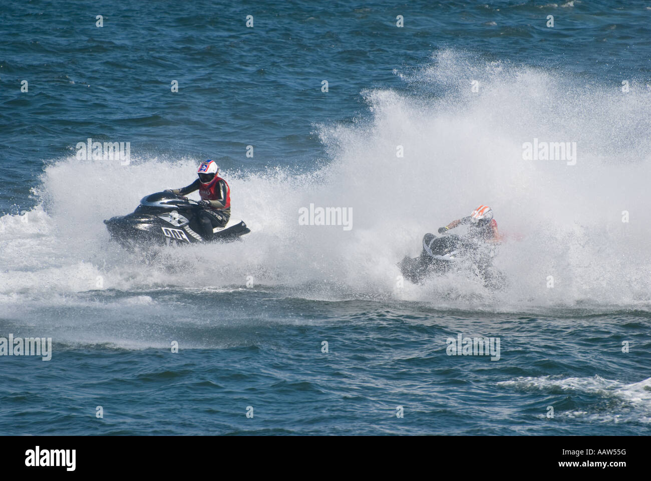 Jet Skiers racing on sea Stock Photo - Alamy