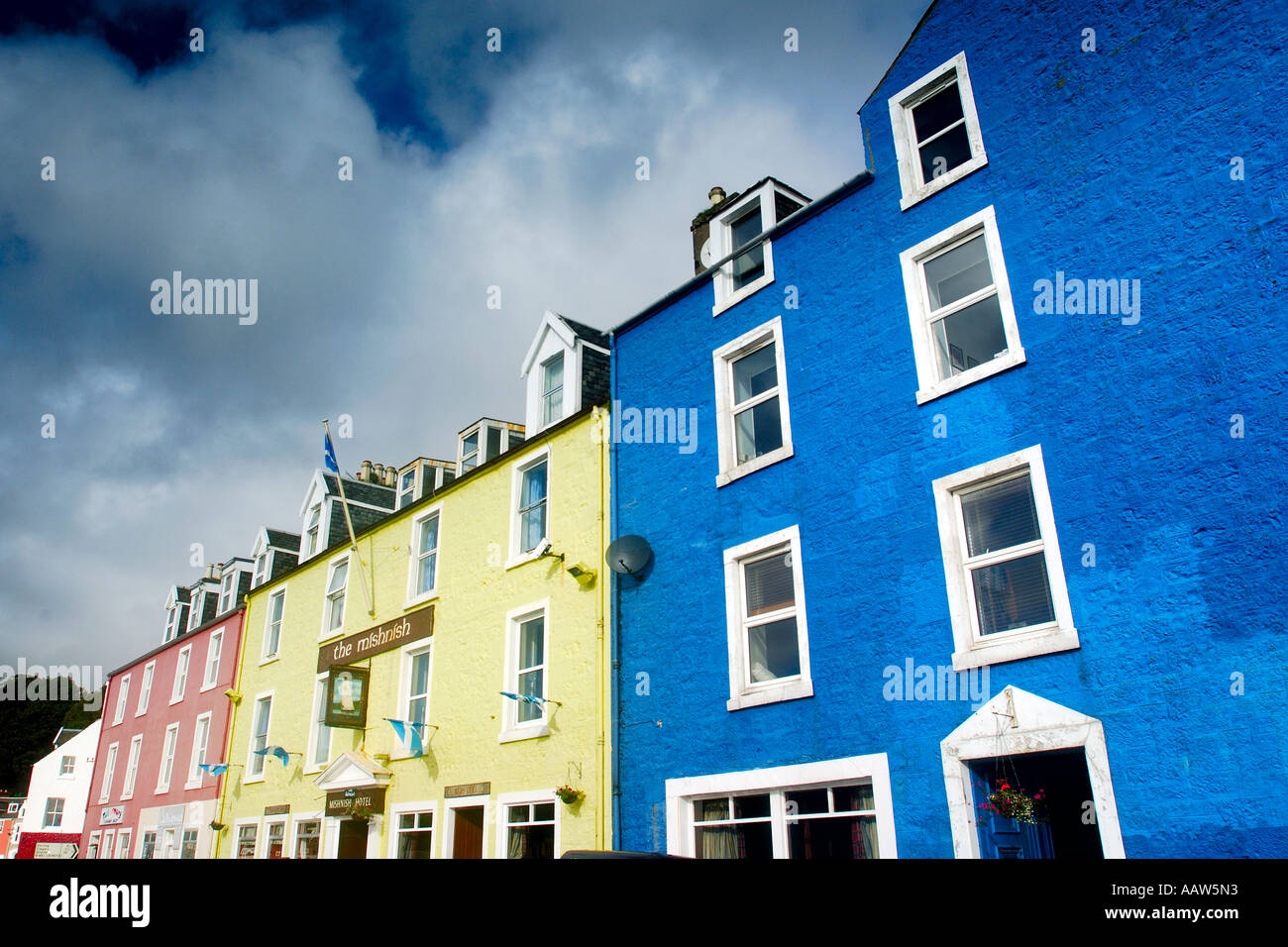 Terrace of three brightly coloured buildings in Tobermory Isle of Mull ...