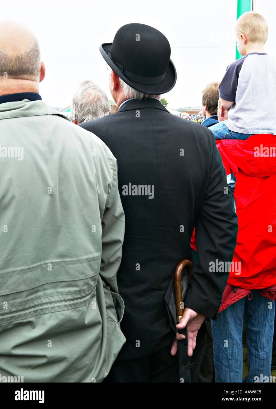 Man wearing bowler hat uk hi-res stock photography and images - Alamy