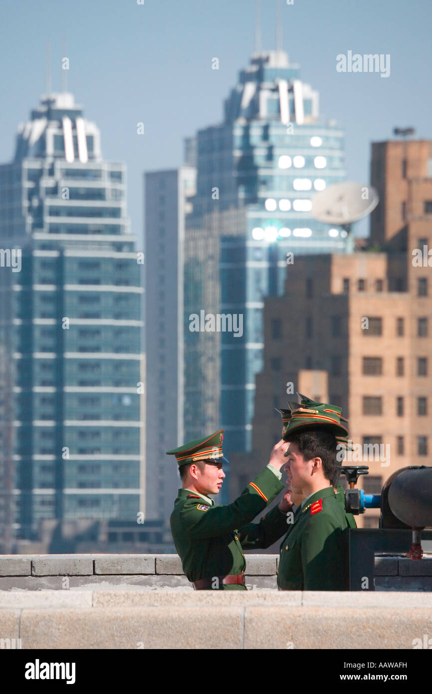 Military officer correctiing posture of recruit Shanghai China Stock ...
