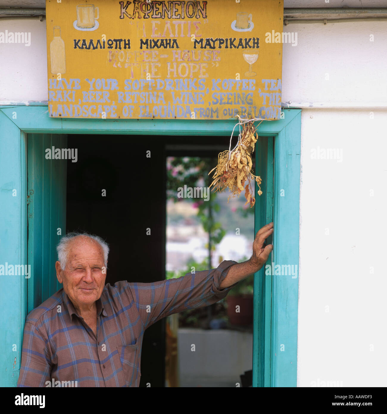 OLD MAN AT CAFE NEON CRETE Stock Photo - Alamy