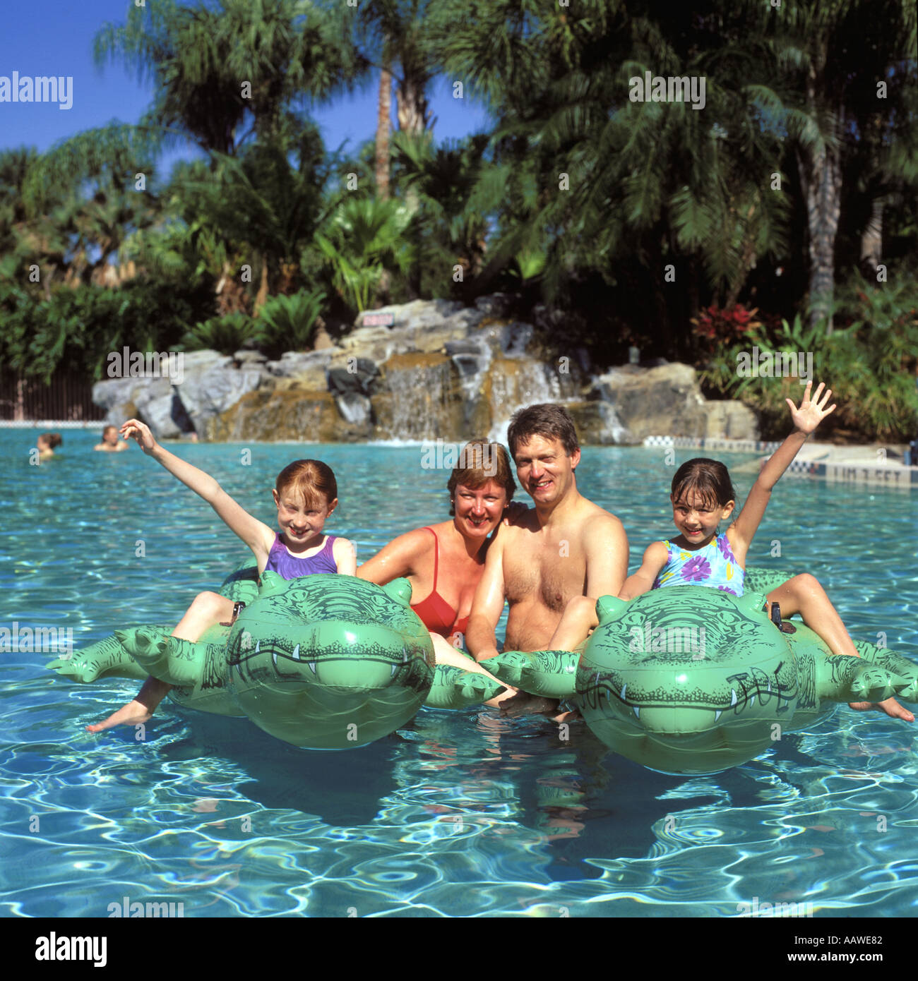 FAMILY IN POOL ORLANDO FLORIDA Stock Photo - Alamy