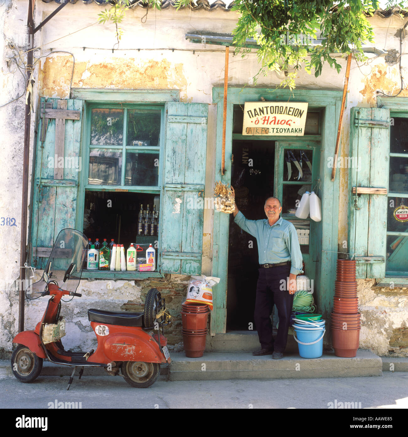 GREEK SHOPKEEPER AT DOOR OF OLD STORE Stock Photo - Alamy