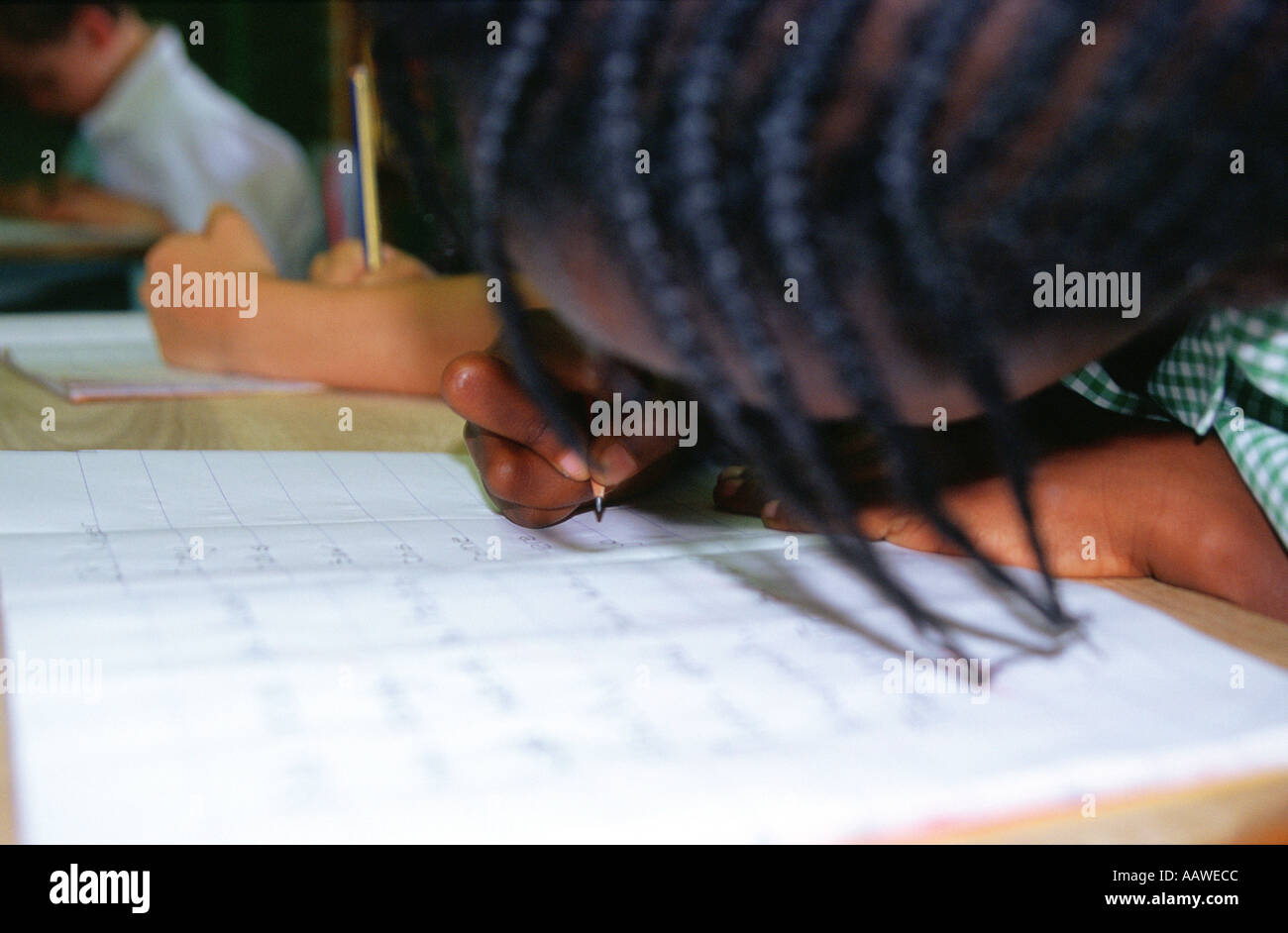 Grade 1 children writing classroom hi-res stock photography and images ...
