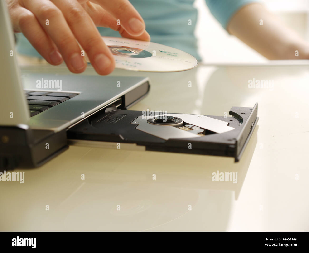 Putting Cd In Cd Drive High Resolution Stock Photography and Images - Alamy