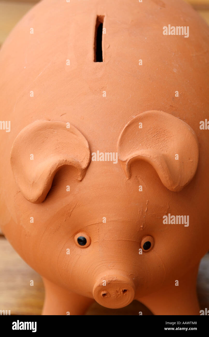 Childs Piggy bank made from clay Stock Photo - Alamy