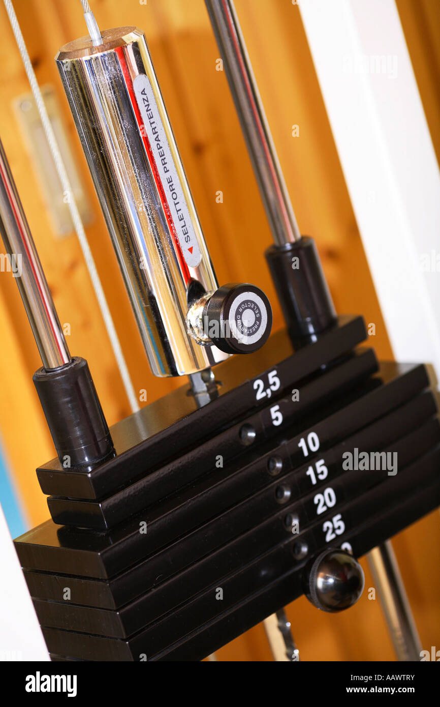 Weight stack of a training machine Stock Photo - Alamy