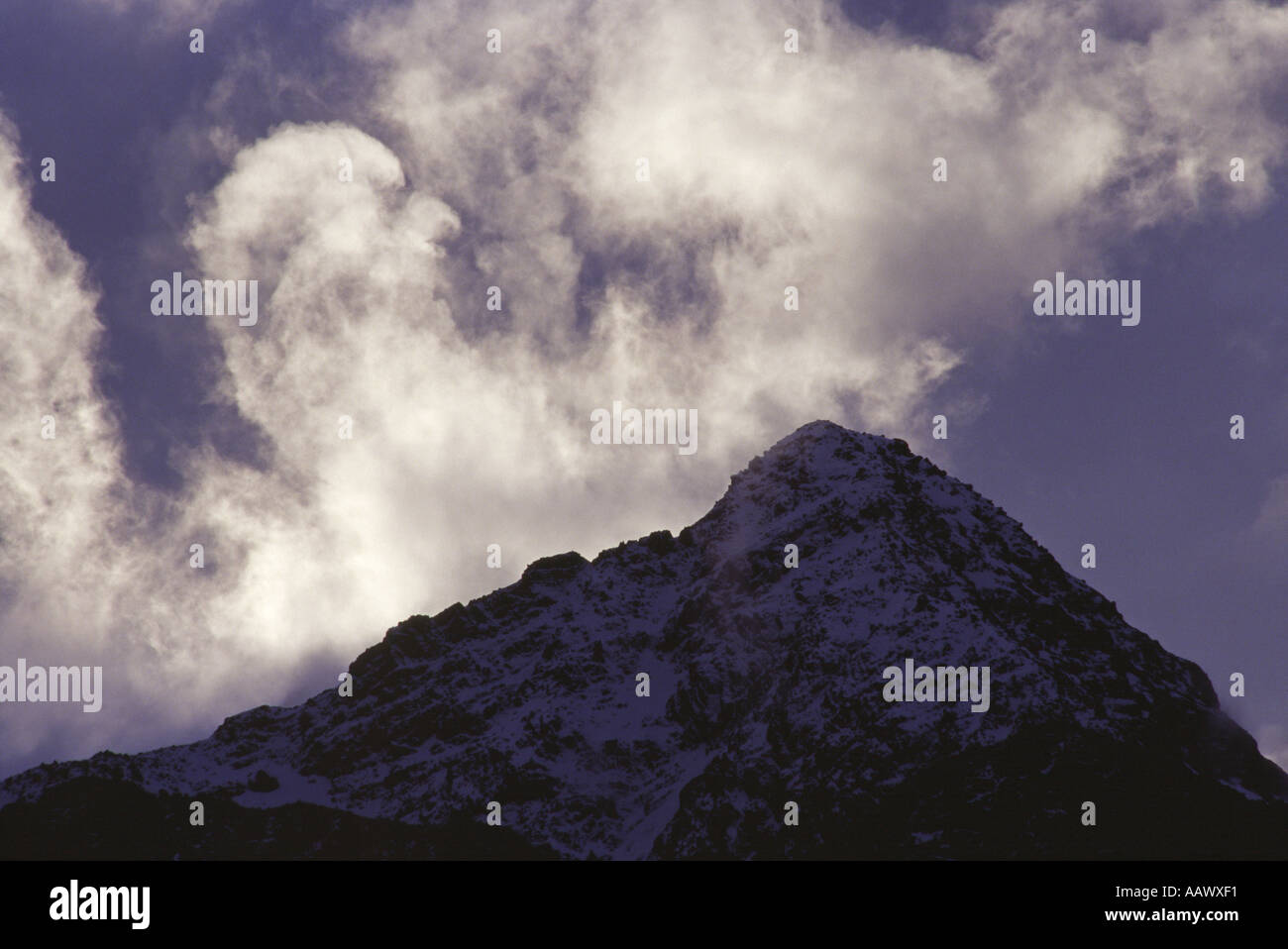 Mount Rolleston ridge and cloud in sunlight Arthurs Pass Canterbury New ...
