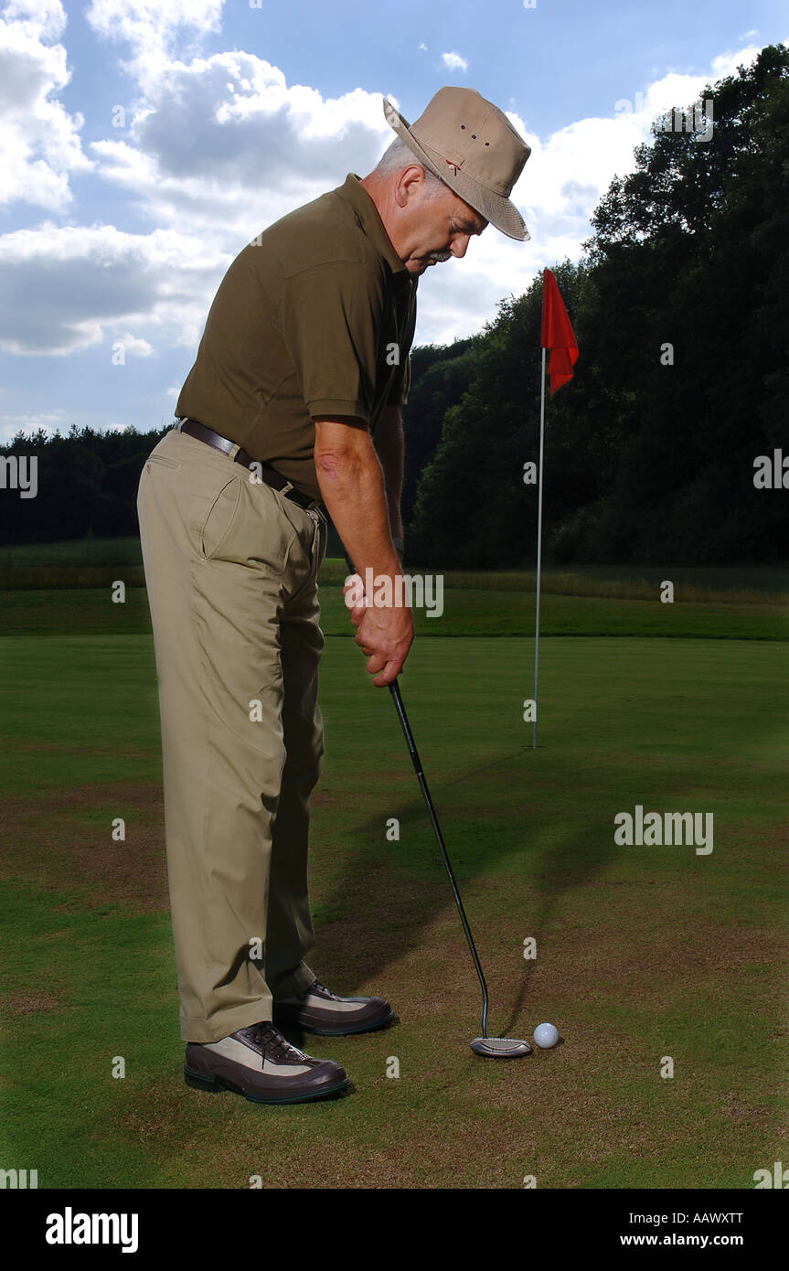 64 year old man playing golf Stock Photo - Alamy