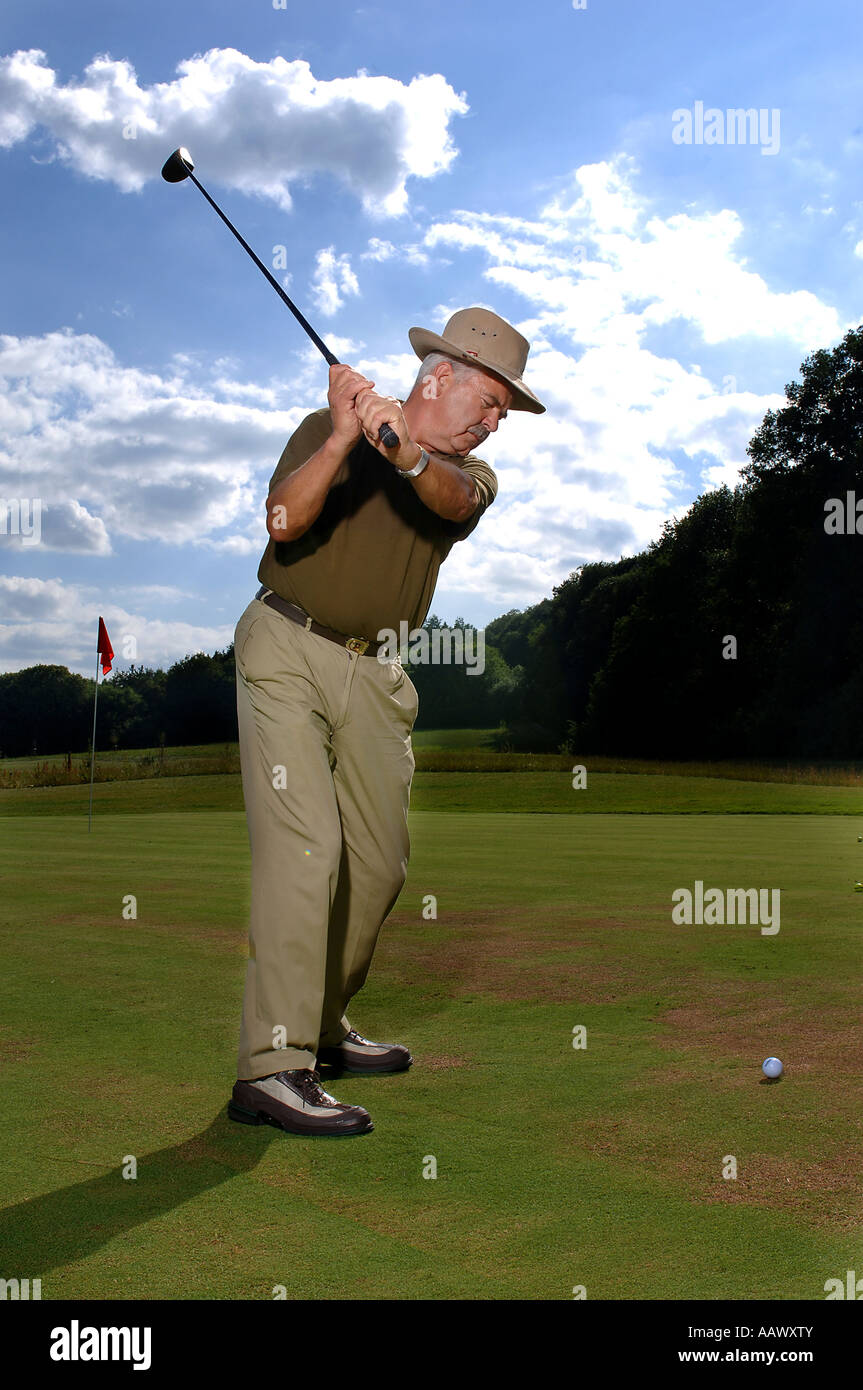 64 year old man playing golf Stock Photo - Alamy