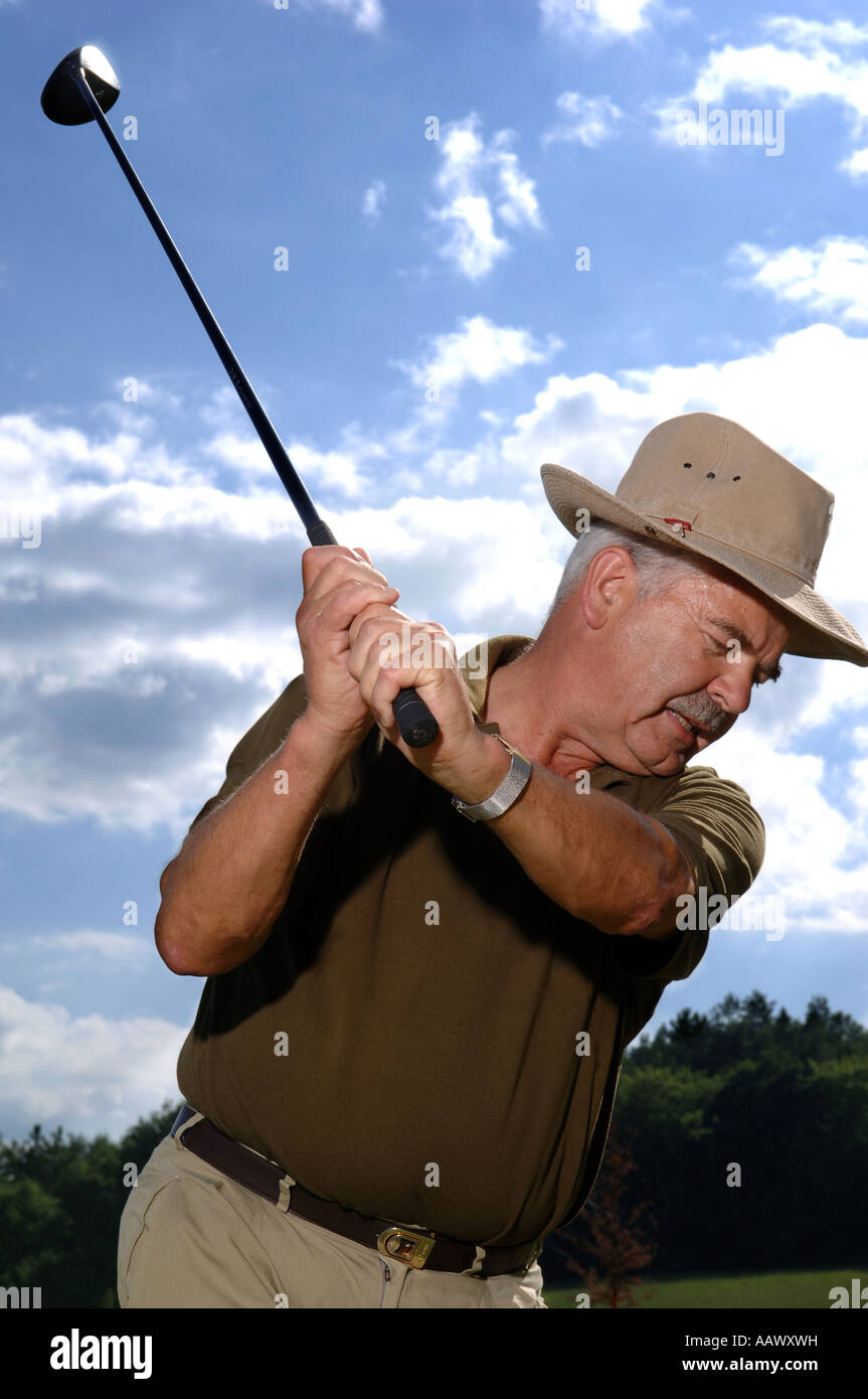 64 year old man playing golf Stock Photo - Alamy