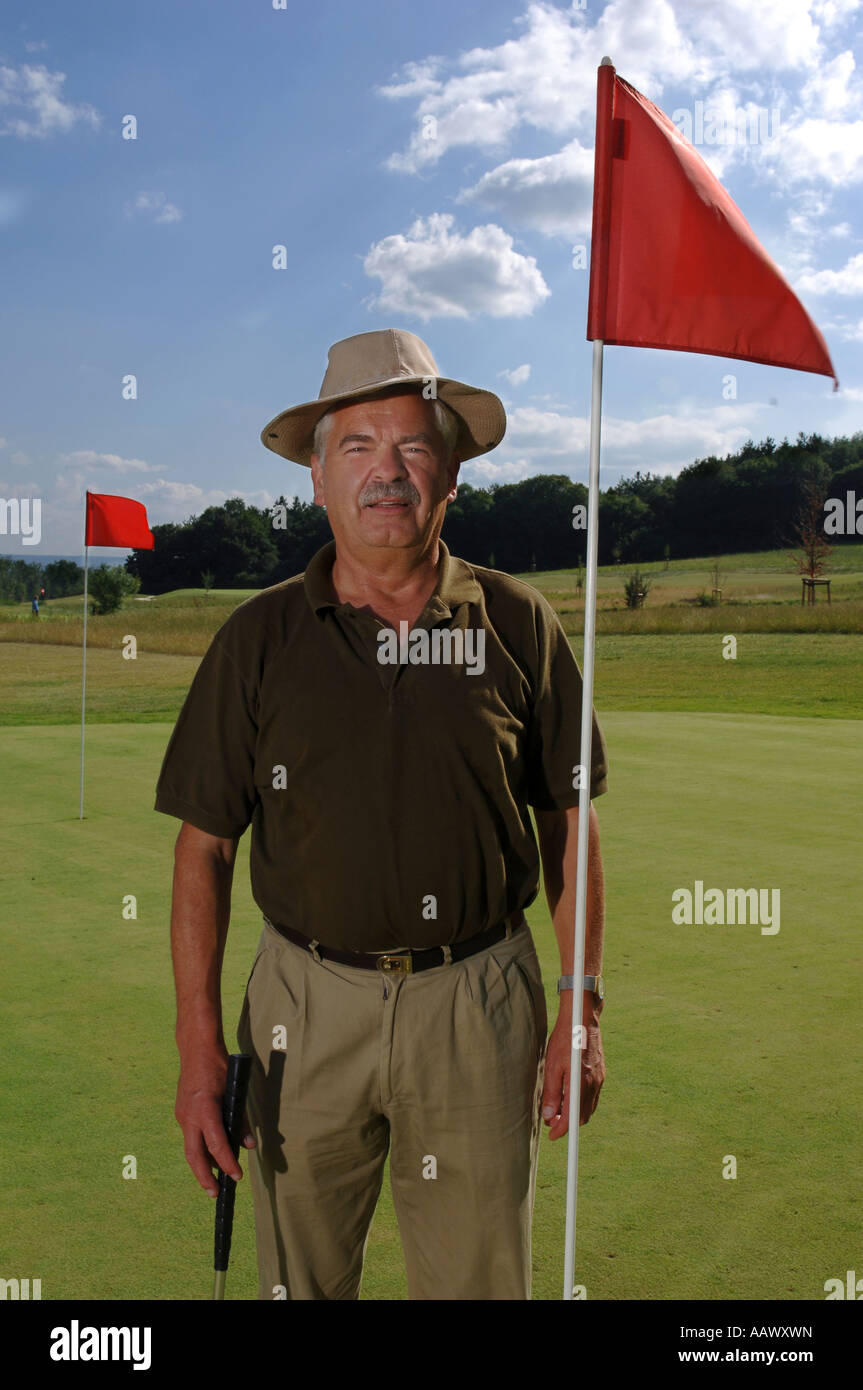 64 year old man playing golf Stock Photo - Alamy