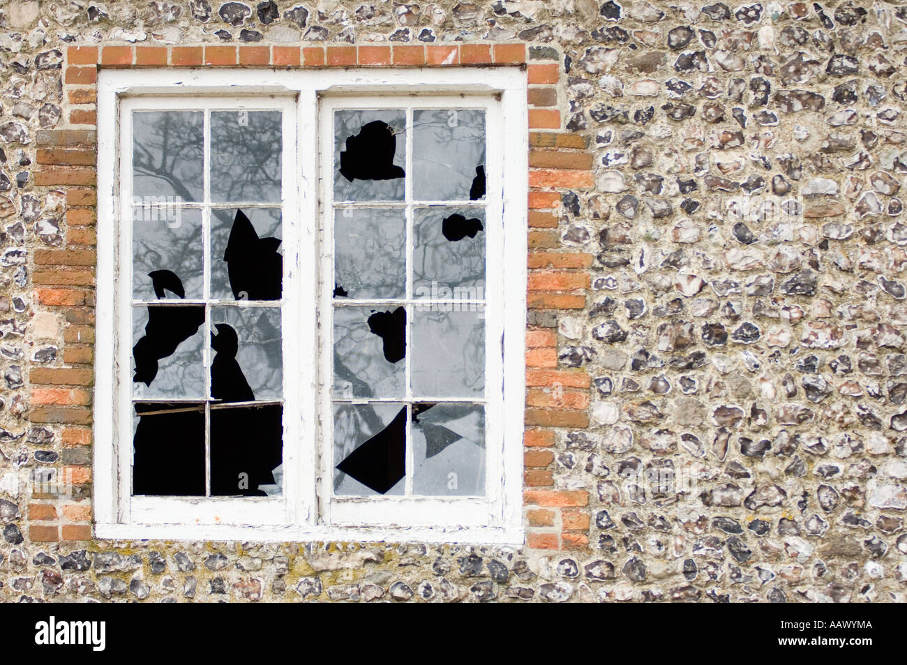 Smashed window panes in an old house Stock Photo - Alamy