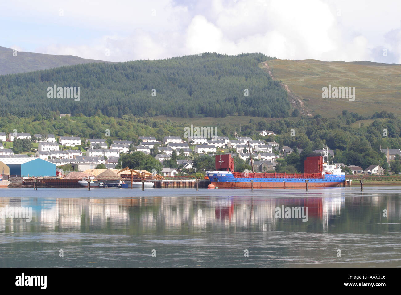 Corpach Scotland port dry cargo ship alongside harbour loading timber ...