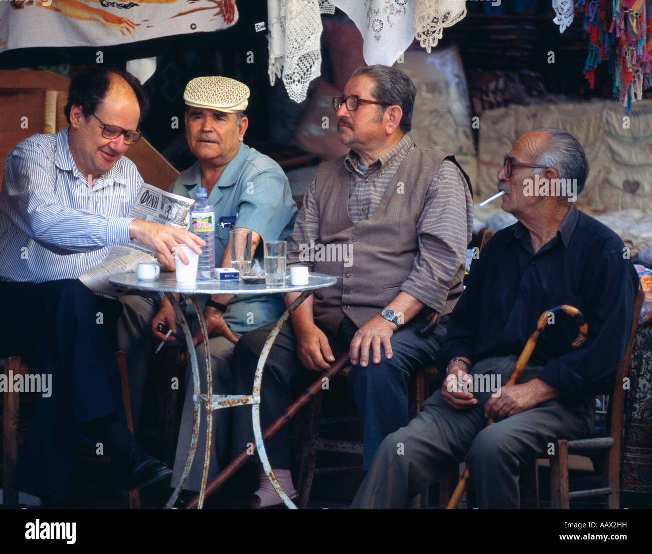 Men drinking at taverna in Iraklion Crete Greece Stock Photo - Alamy