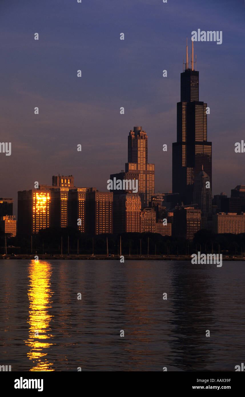 Chicago Skyline of Chicago with sunrise reflections on Lake Michigan ...
