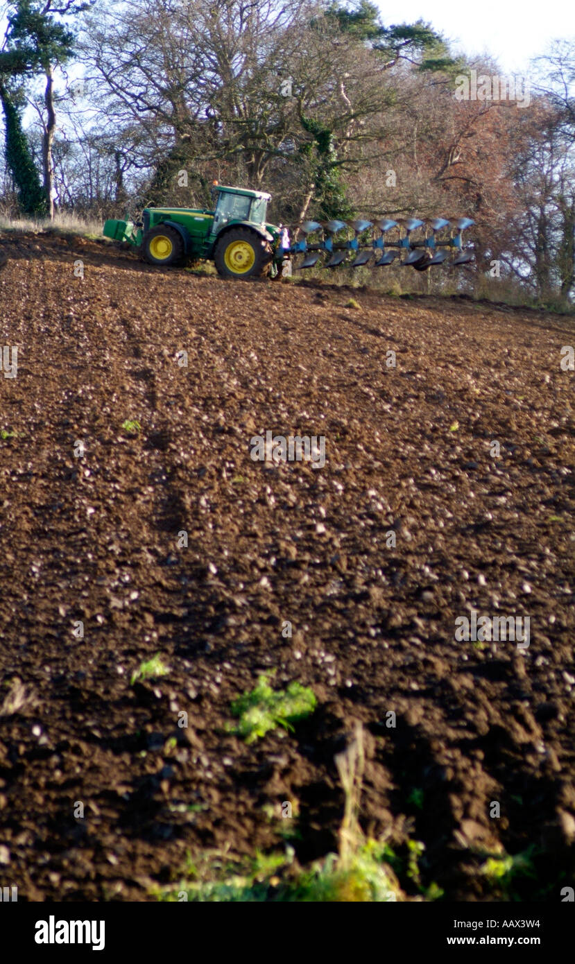 Portrait picture of tractor turning at end of ploughing run Stock Photo ...