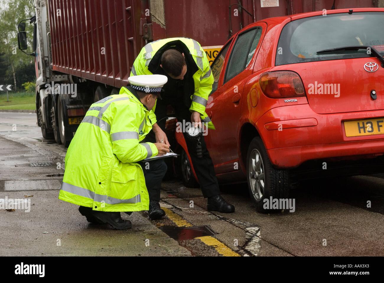 Police Officers investigate road traffic accident (RTA Stock Photo - Alamy