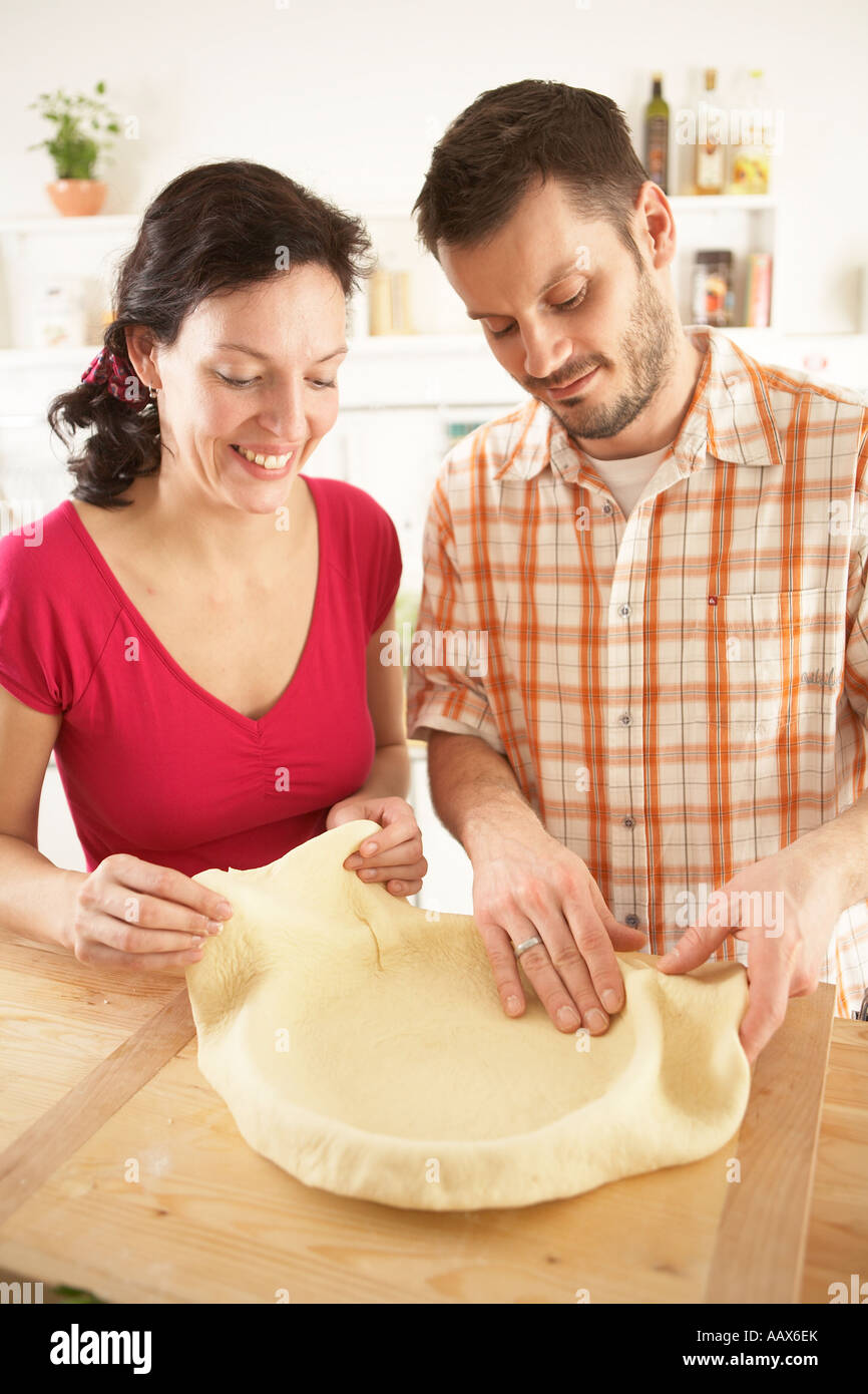Two men preparing pies hi-res stock photography and images - Alamy