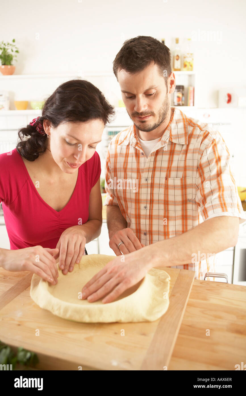 Two men preparing pies hi-res stock photography and images - Alamy