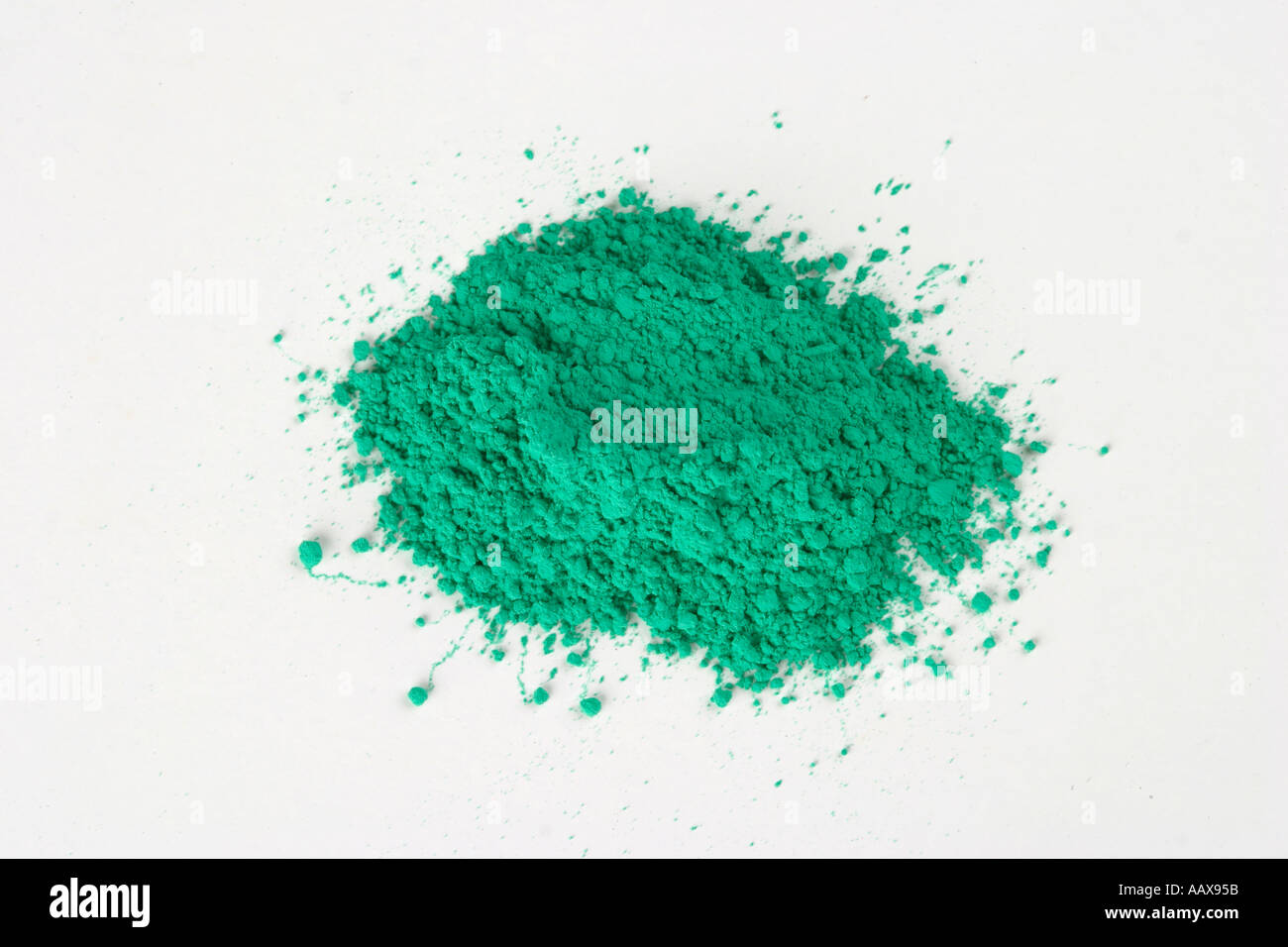 pile of green powder paint on a white background Stock Photo - Alamy