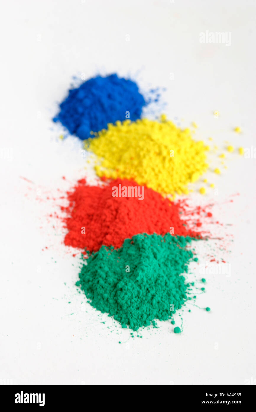 four piles of red green yellow and blue paint powder Stock Photo - Alamy