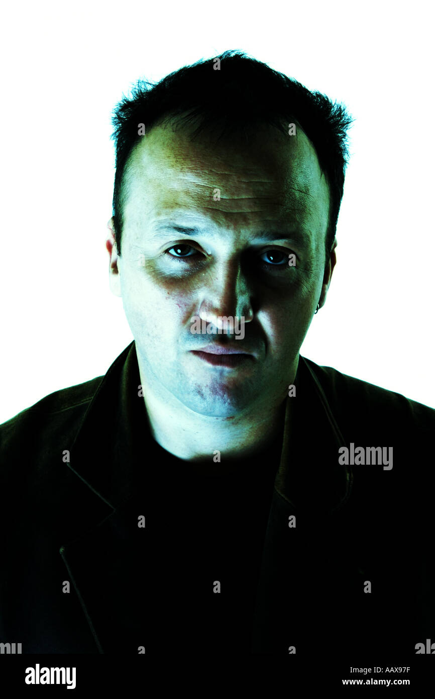 Sinister looking man Stock Photo - Alamy