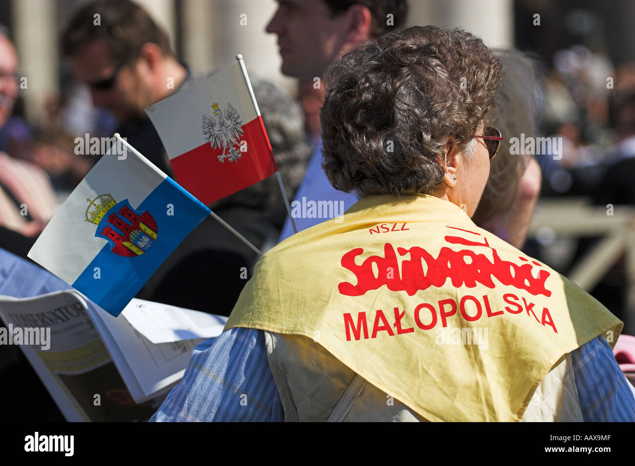 Polish pilgrims with solidarnosc banner and flags at St. Peter Square ...