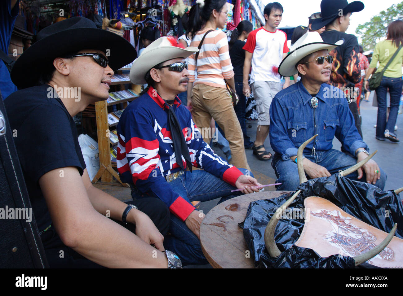 Thai cowboys in Chatuchak Weekend Market in Bangkok, Thailand Stock ...