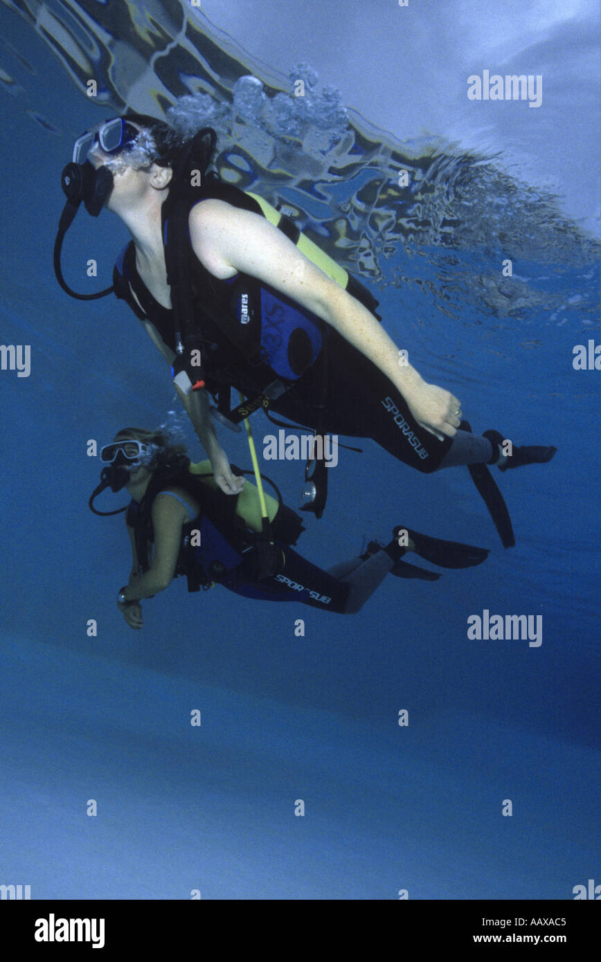 SCUBA diver training in swimming pool Stock Photo - Alamy