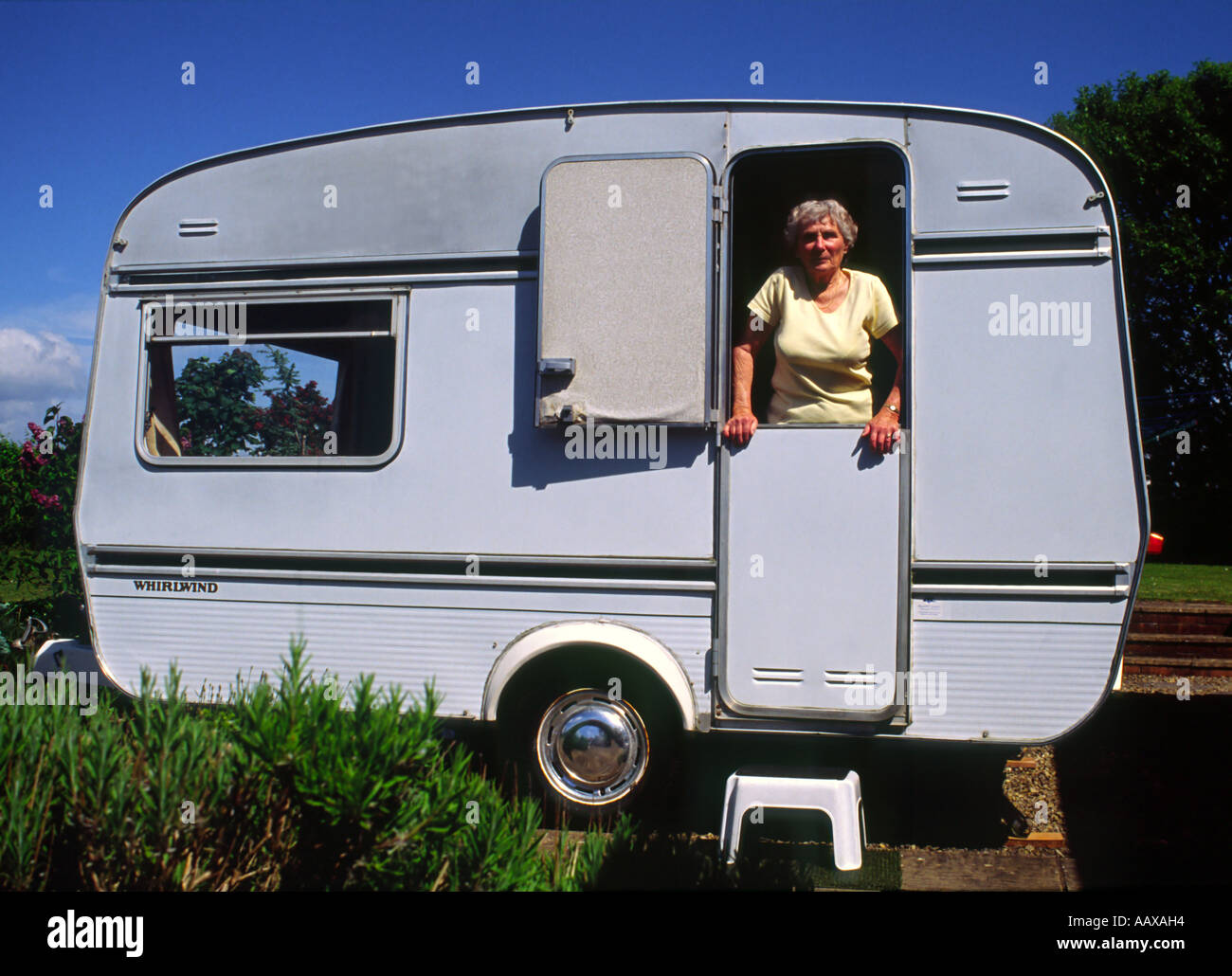 Elderly woman in caravan Stock Photo - Alamy
